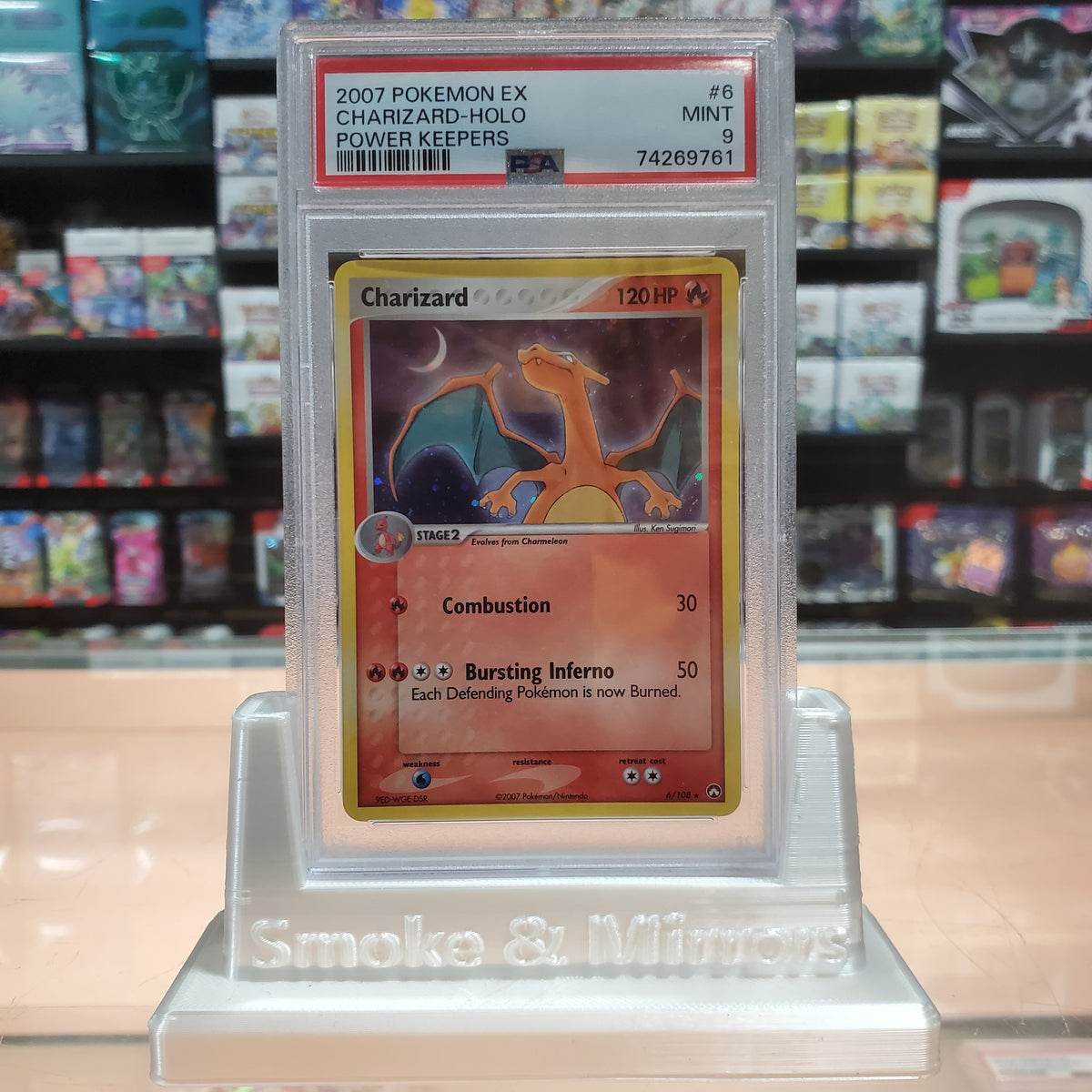 Charizard (6/108) [EX: Power Keepers] PSA 9 — Smoke and Mirrors Hobby