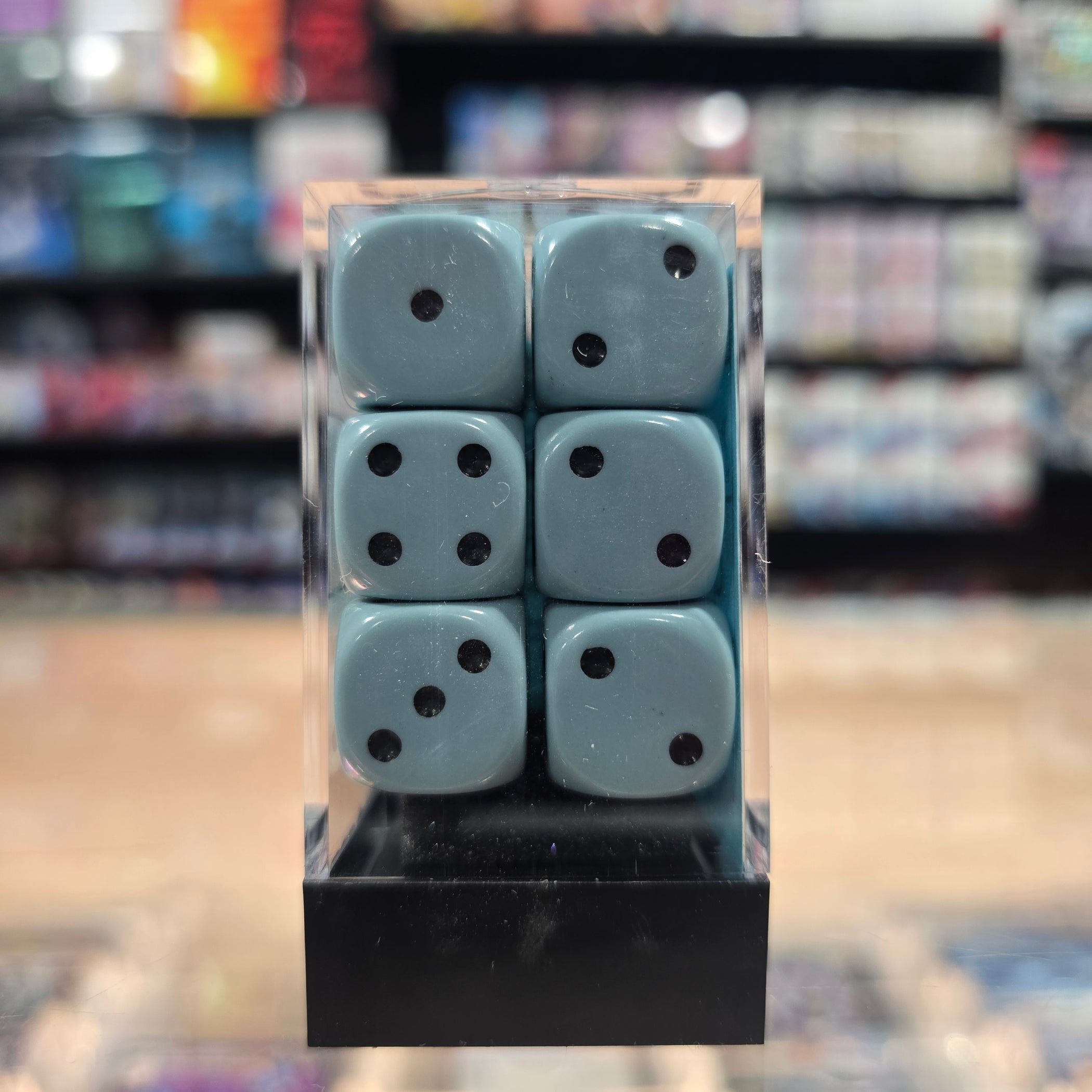 Chessex: Opaque - 16mm D6 12PC Dice Block (Pastel Blue & Black) — Smoke ...