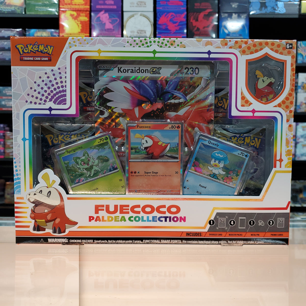 Pokémon TCG: Paldea Collection (Fuecoco) — Smoke and Mirrors Hobby